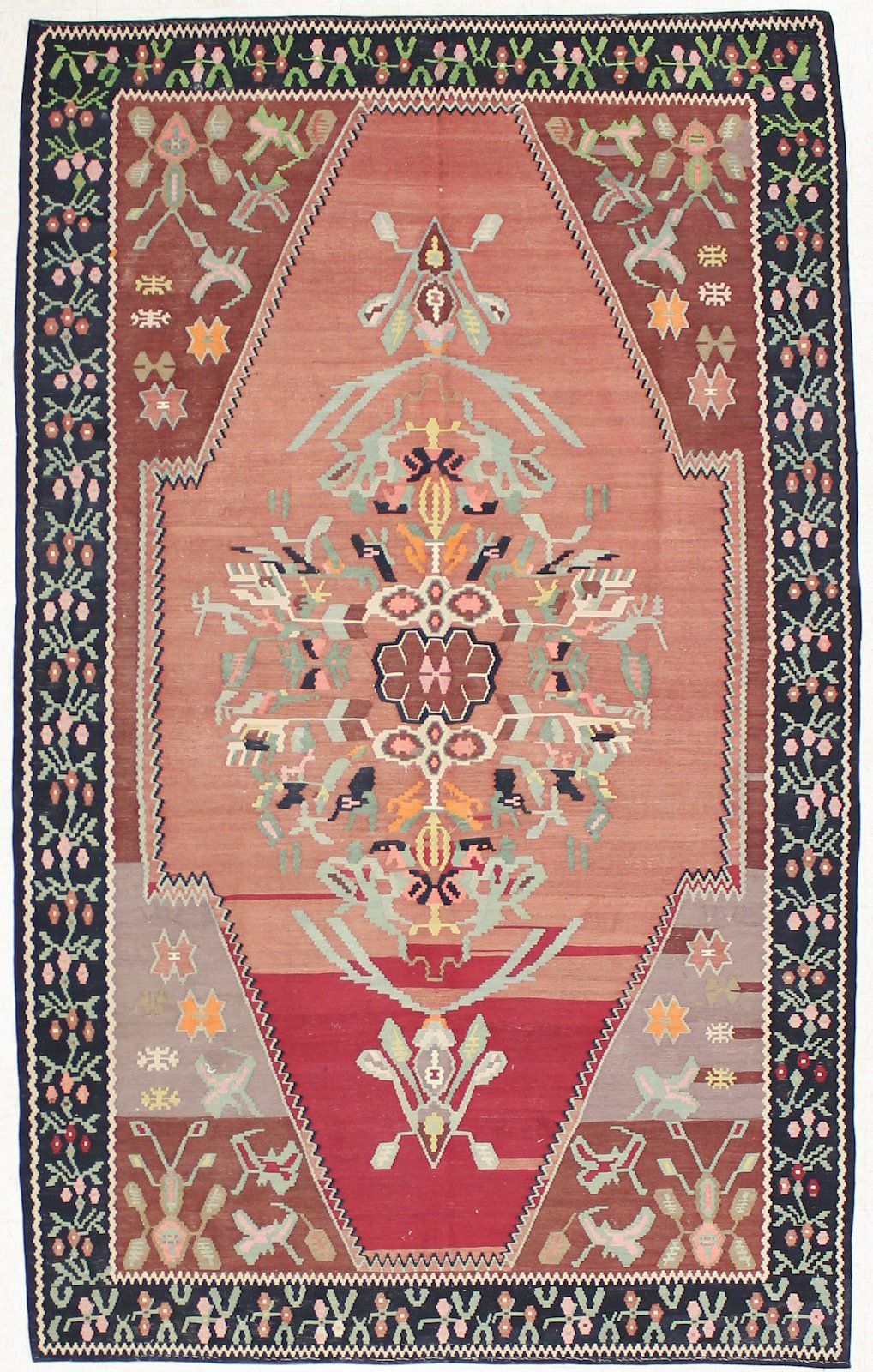 Rust Karaman Rug #1594 • 5′7″ x 8′11″ • 100% Wool • Hasan's Rugs